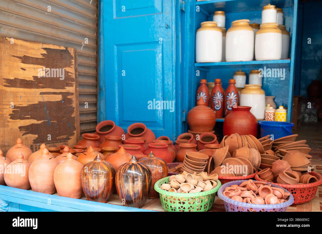 Handmade clay pottery at a market stall in India, handicraft terracotta ...