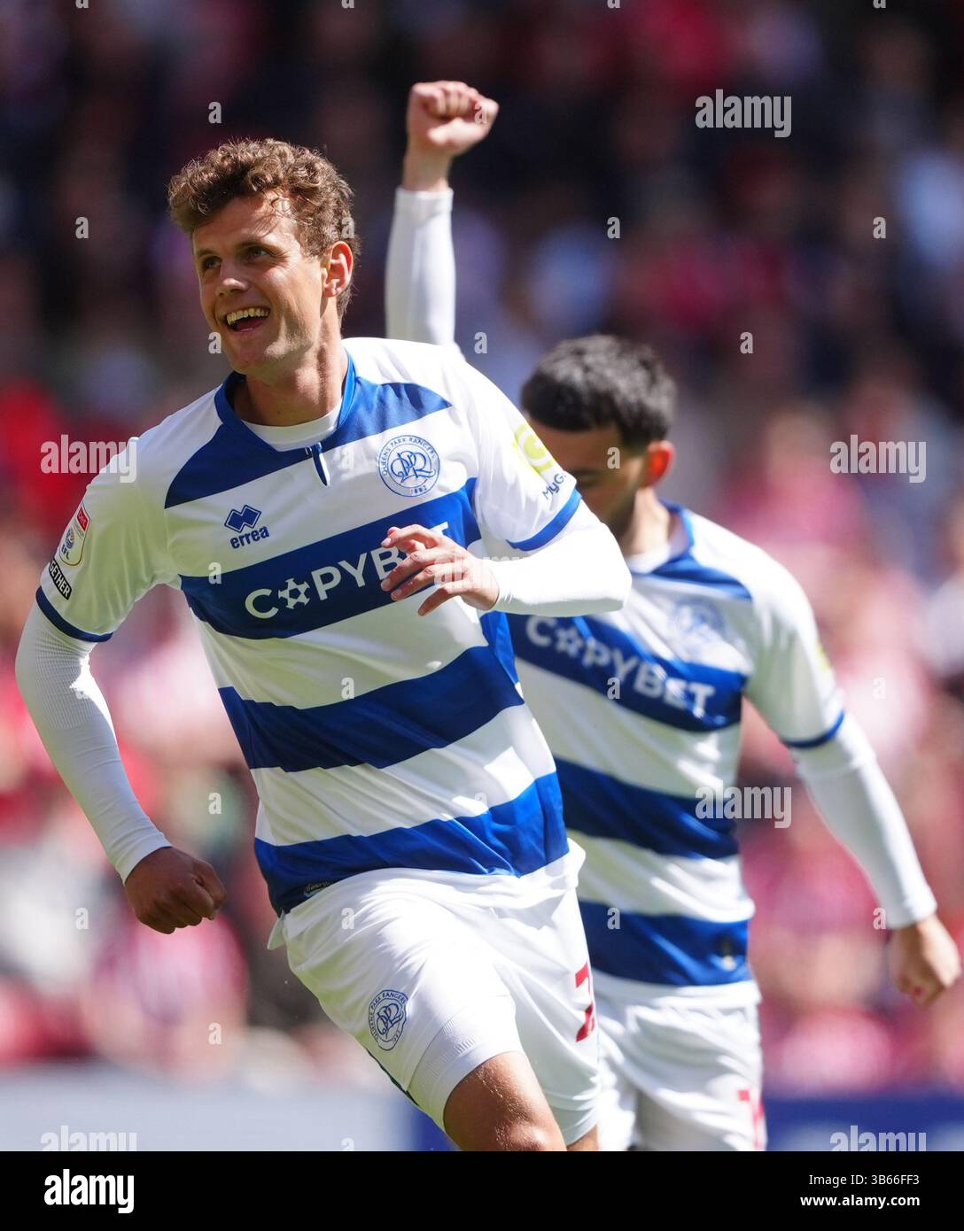 Queens Park Rangers' Nicolas Madsen (left) celebrates scoring their ...