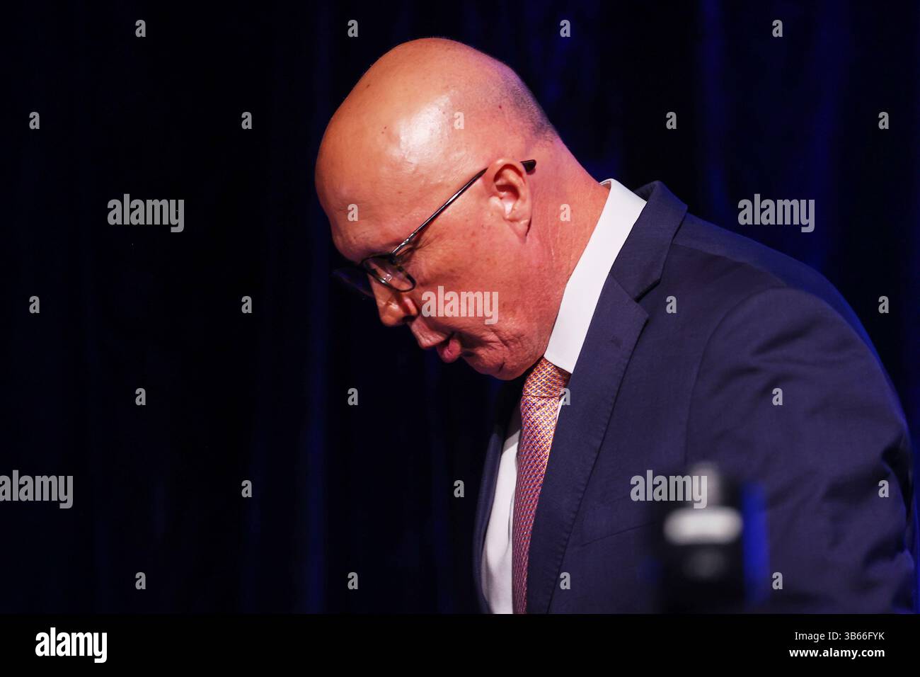 Australian Liberal Party leader Peter Dutton walks from the stage after ...