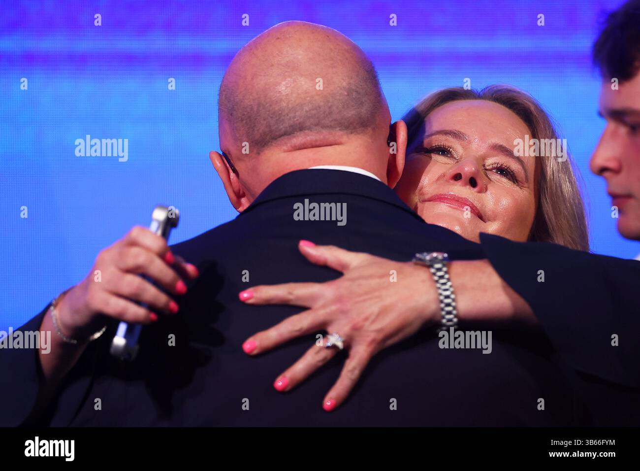 Australian Liberal Party leader Peter Dutton embraced by his wife ...