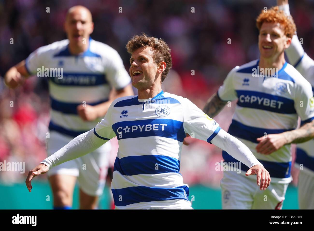 Queens Park Rangers' Nicolas Madsen (centre) celebrates scoring their ...
