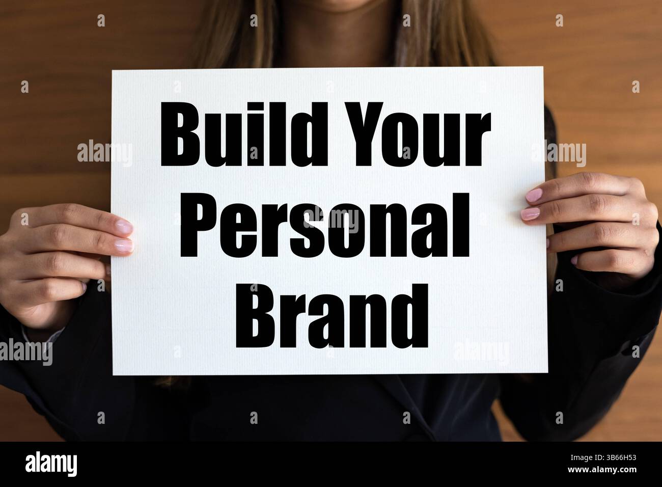 Build your personal brand Build your personal brand. Woman holds a ...
