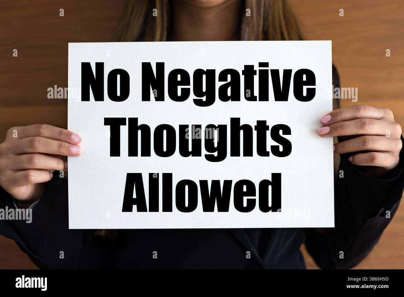 No negative thoughts allowed No negative thoughts allowed. Woman holds ...