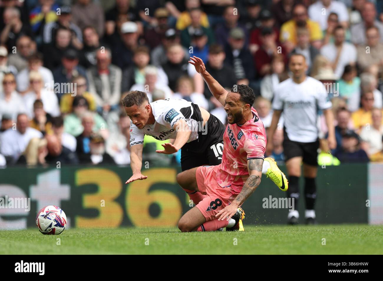 Derby County's Jerry Yates (left) and Stoke City’s Lewis Baker battle ...