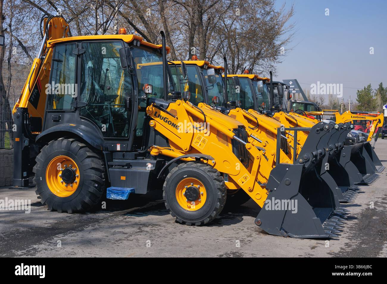 Almaty, Kazakhstan - March 31, 2025: Liugong backhoe loaders in the ...