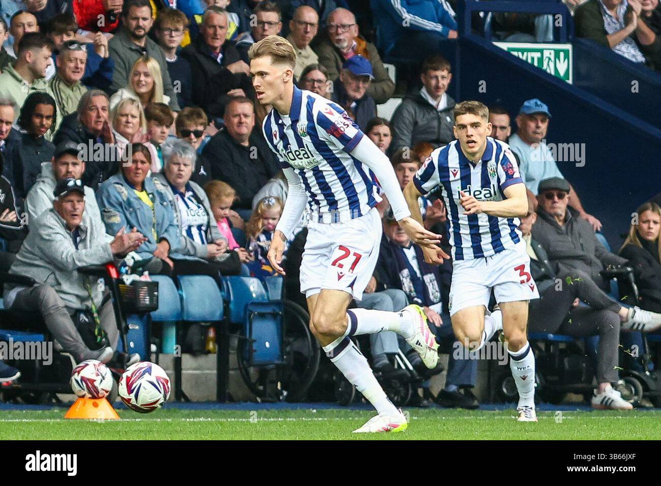 #21, Isaac Price of WBA races forward with the ball during the Sky Bet ...