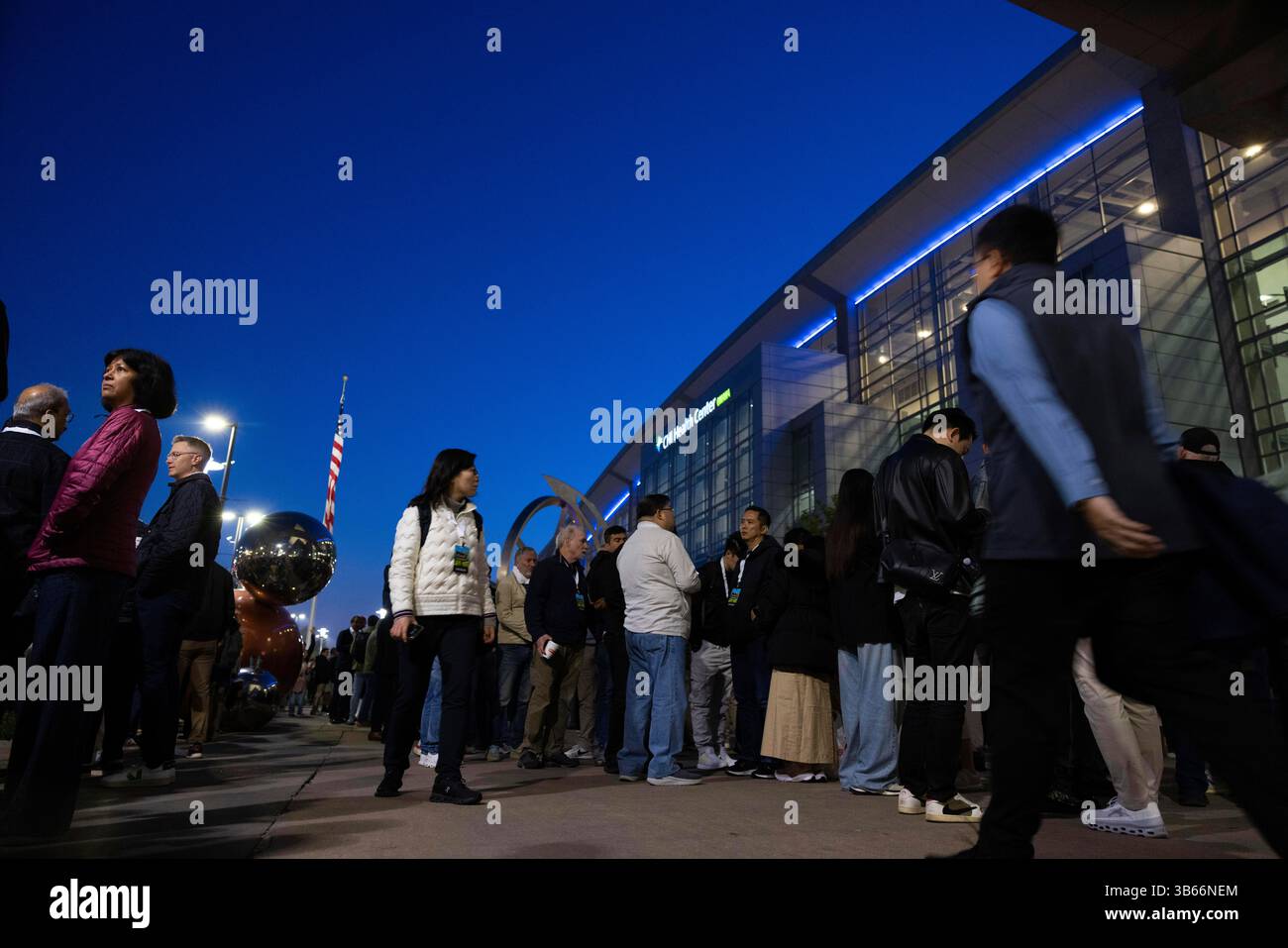 Shareholders wait in line outside CHI Health Center Omaha for the Berkshire Hathaway annual ...