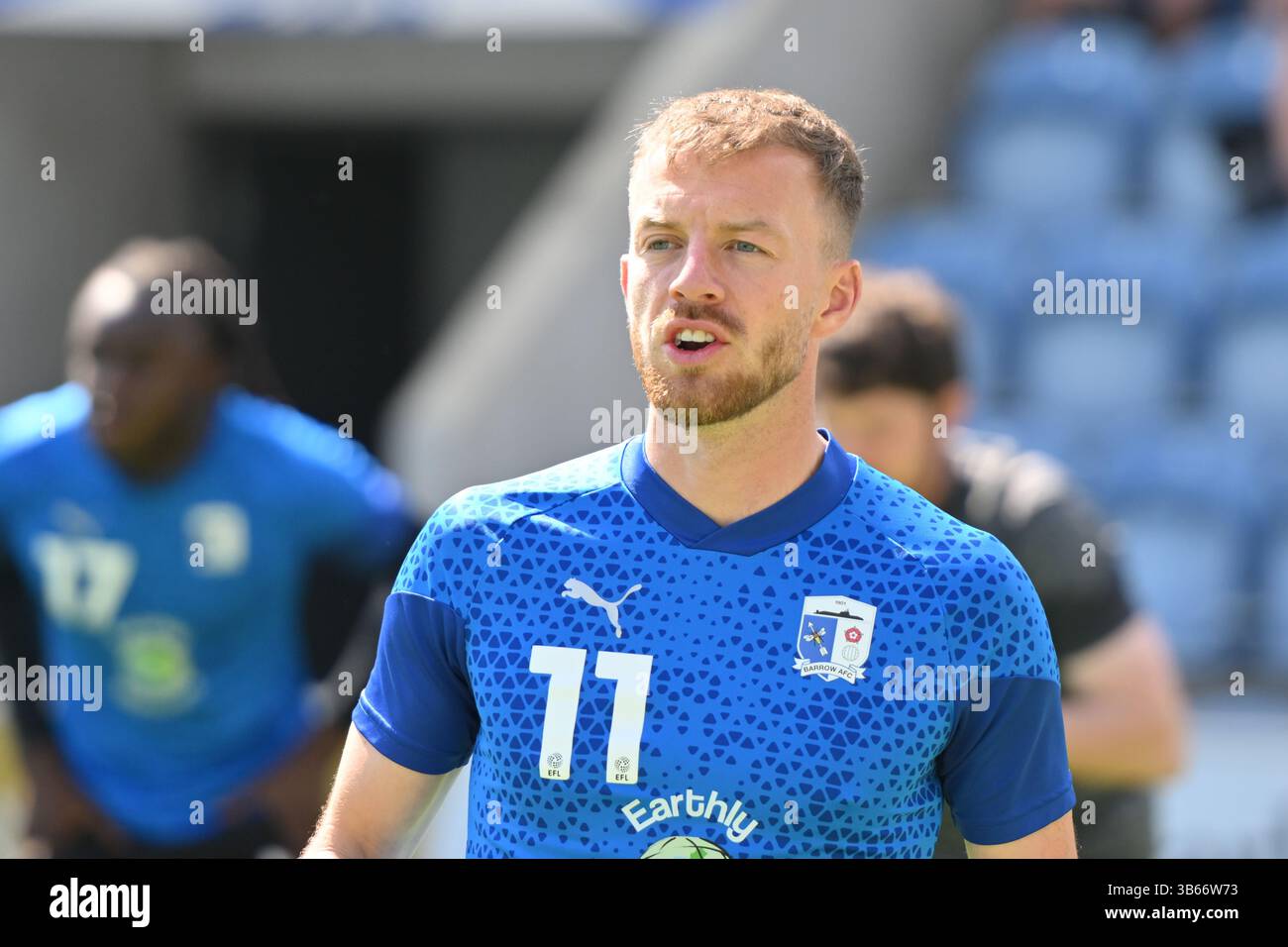 Elliot Newby (11 Barrow) warms up during the Sky Bet League 2 match ...