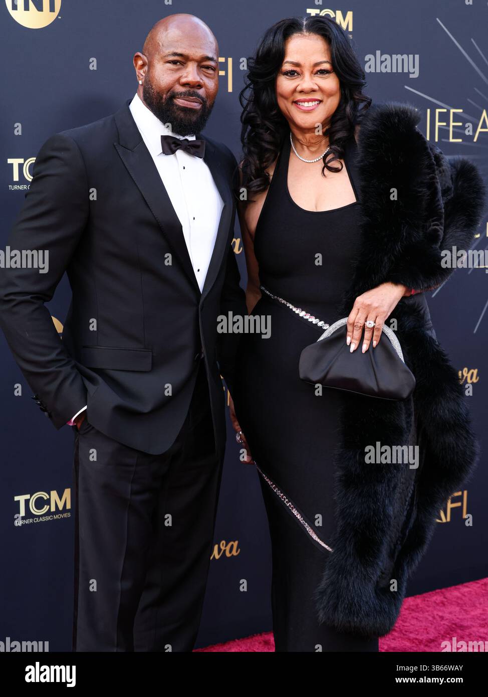 HOLLYWOOD, LOS ANGELES, CALIFORNIA, USA - APRIL 26: Antoine Fuqua and wife Lela Rochon arrive at ...
