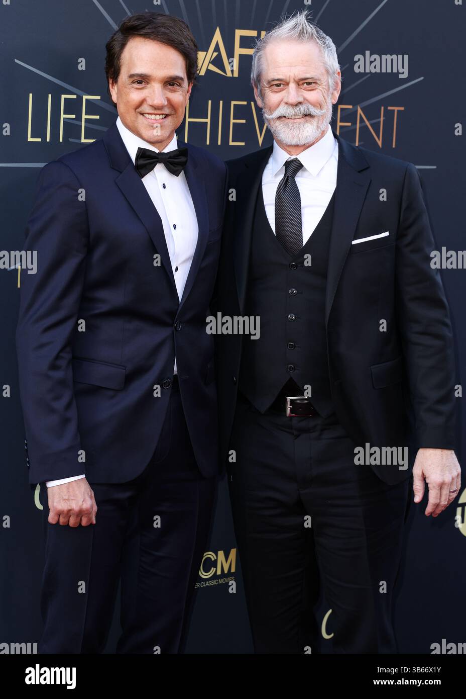 HOLLYWOOD, LOS ANGELES, CALIFORNIA, USA - APRIL 26: Ralph Macchio and C ...
