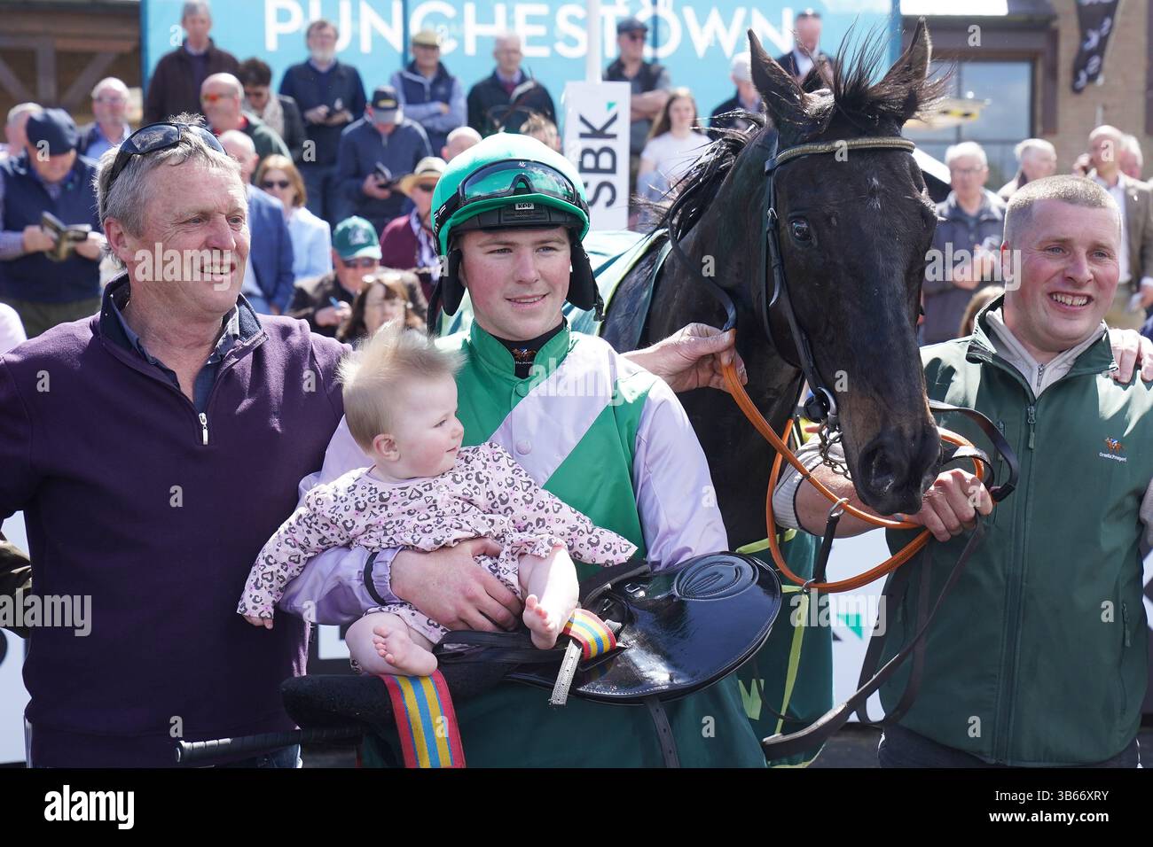 Barry Thomas Stone (centre) celebrates with his 7 month old daughter ...