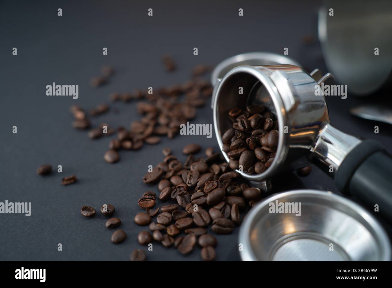 Portafilter, beans, and barista tools on black background—perfect setup ...