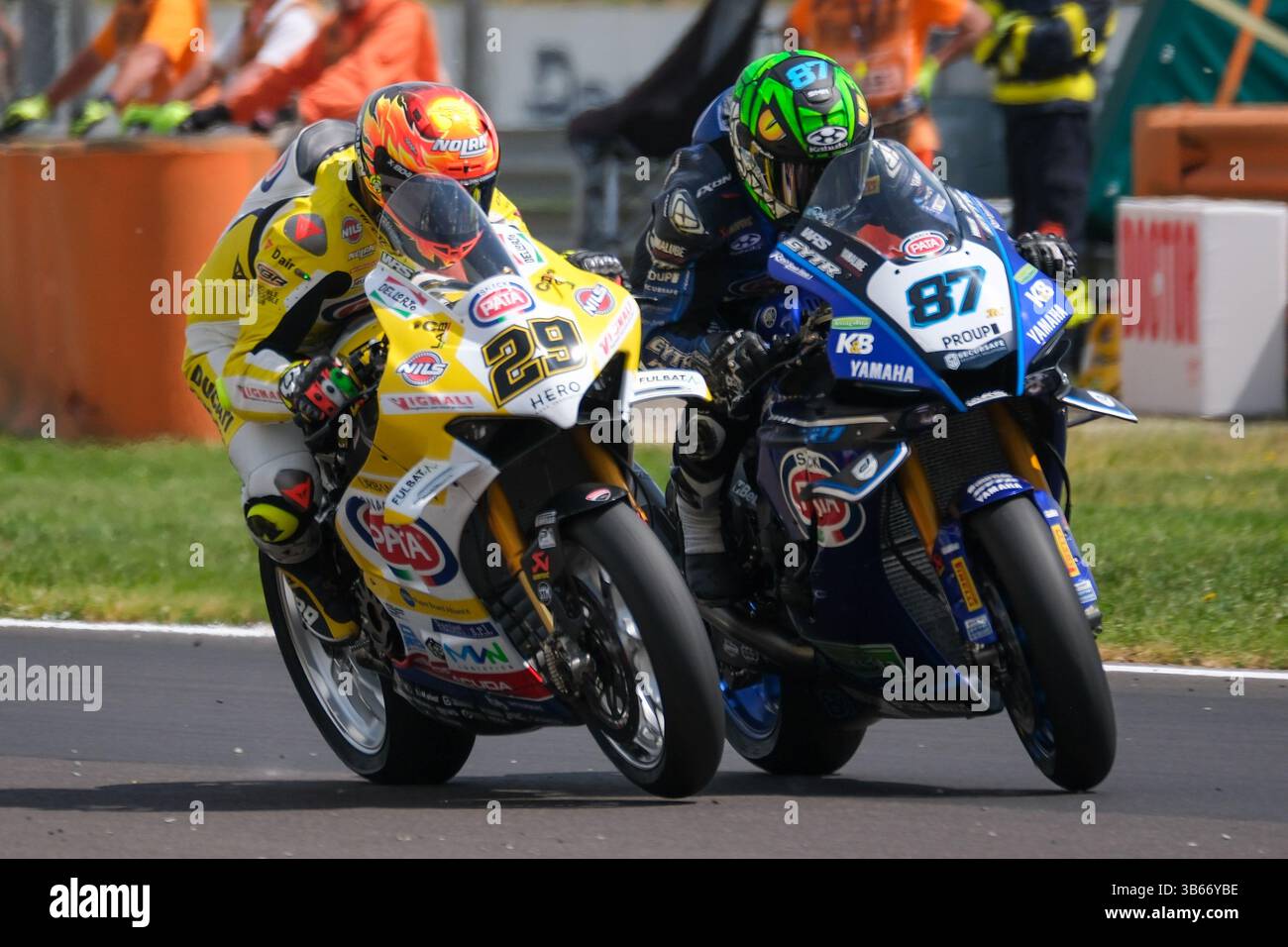 Duel between Andrea Iannone from Italy, rides Ducati Panigale V4R of ...