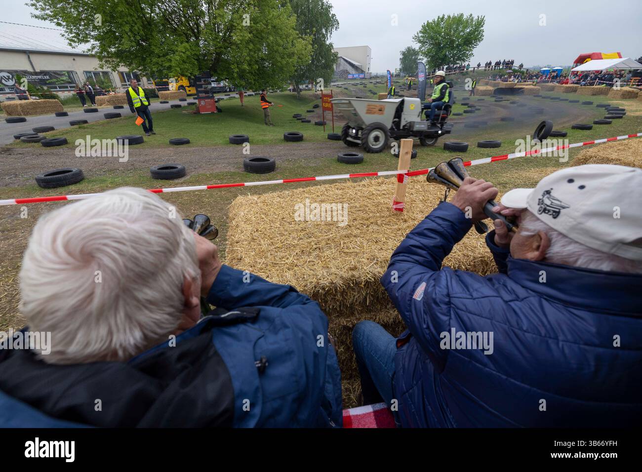 Adelsdorf, Germany. 03rd May, 2025. Two men provide loud support for ...
