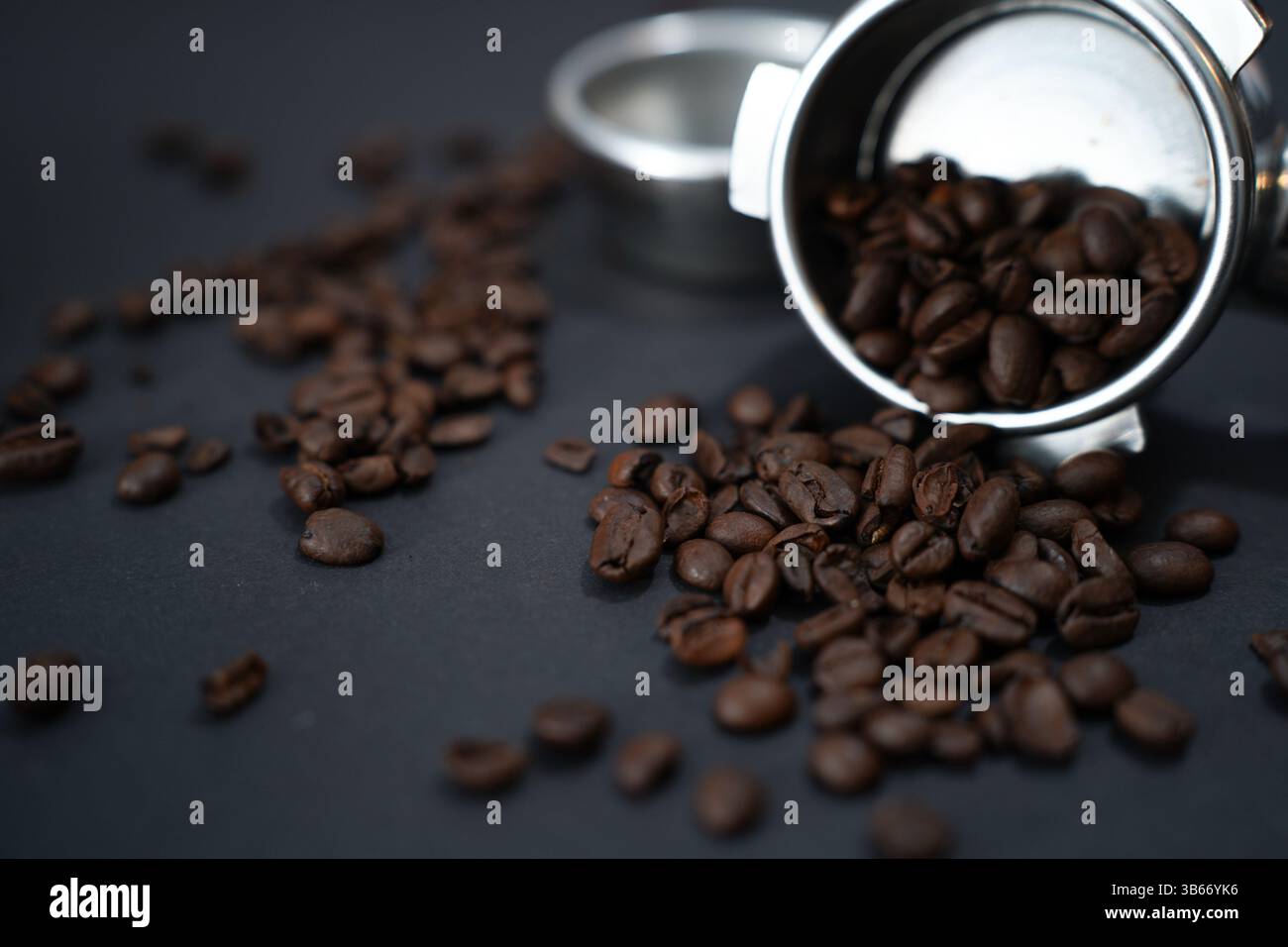 Portafilter, beans, and barista tools on black background—perfect setup ...