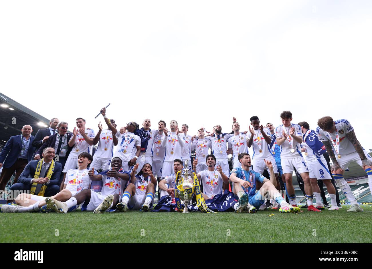 Leeds United players celebrate with the trophy after being crowned champions following the Sky ...