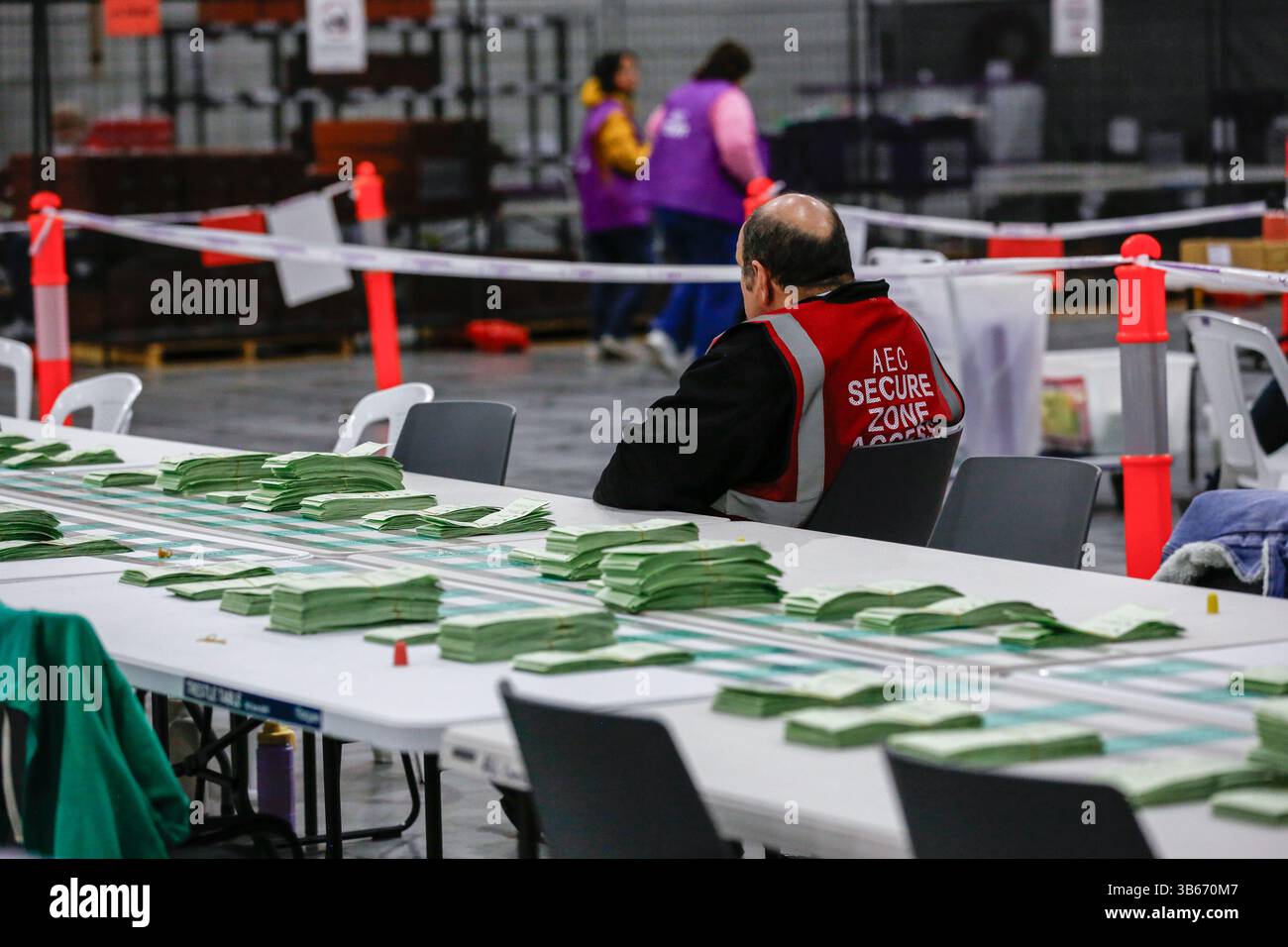 Officials count ballots after voting ended in Australia's general ...