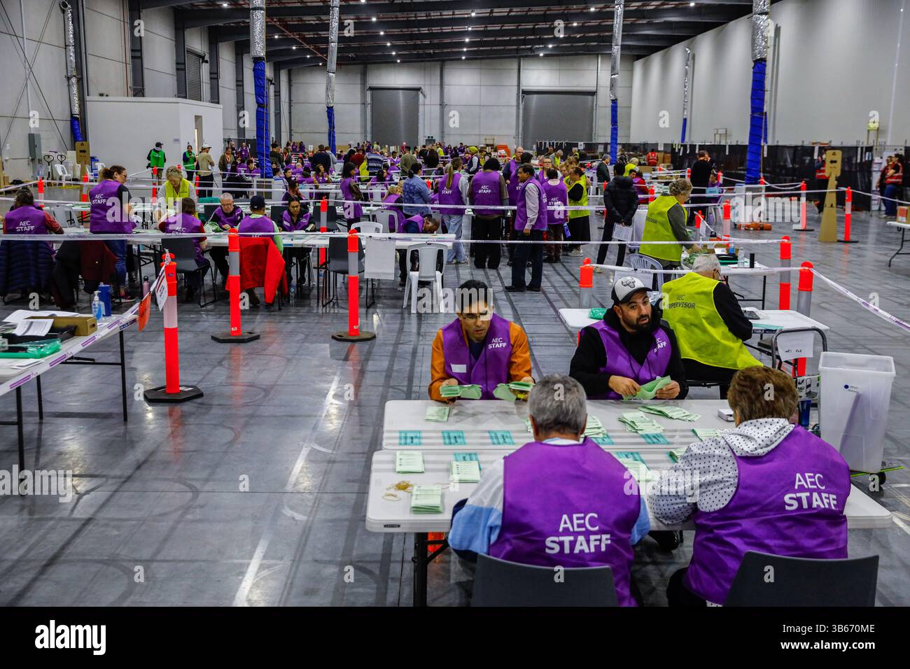 Officials count ballots after voting ended in Australia's general ...
