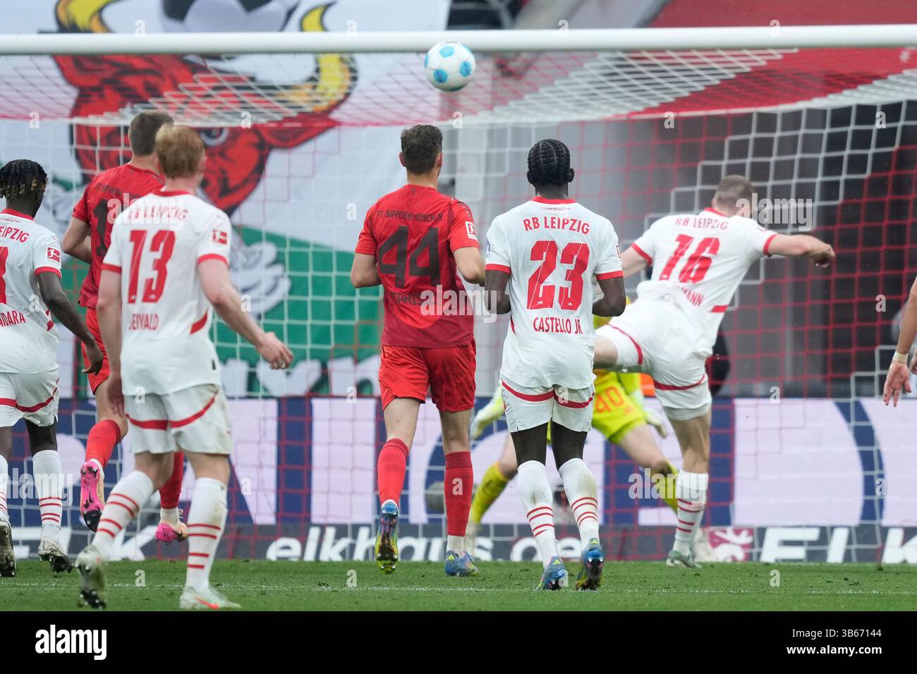 Leipzig's Lukas Klostermann, right, scores his side's second goal ...