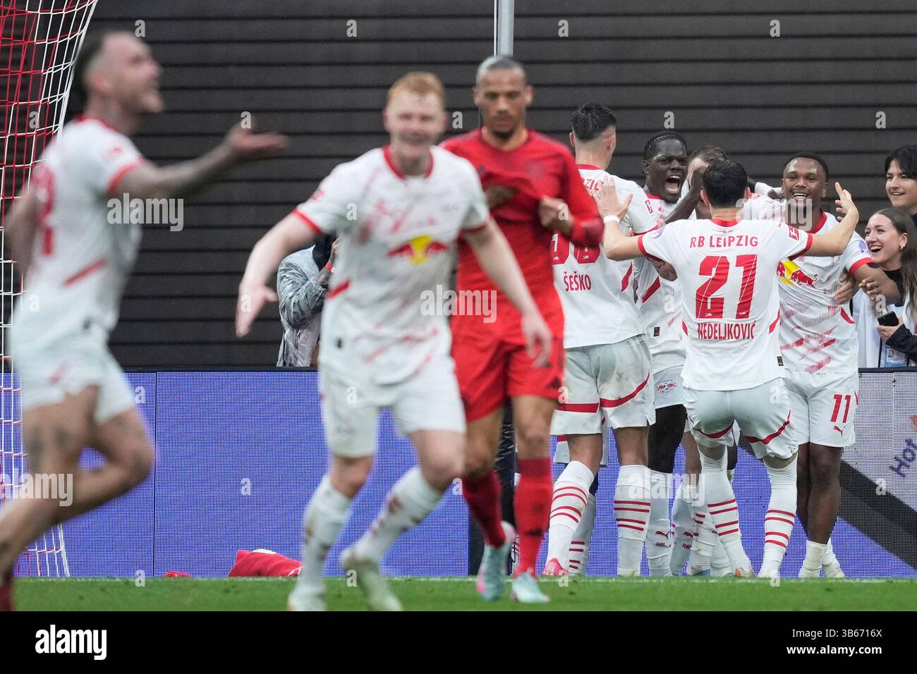 RB Leipzig players celebrate after Leipzig's Lukas Klostermann scored ...