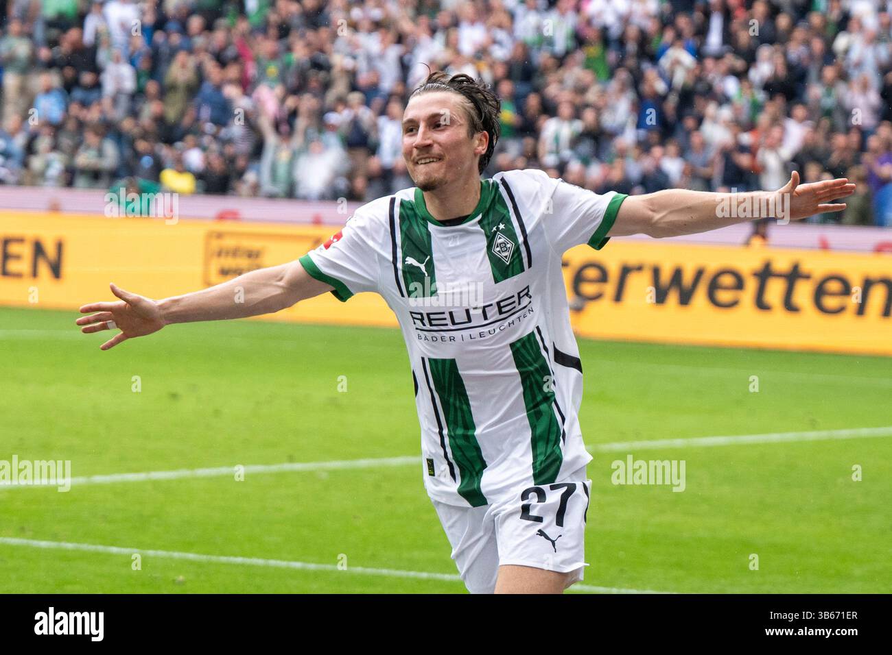 Gladbach's Rocco Reitz celebrates scoring during the Bundesliga soccer ...