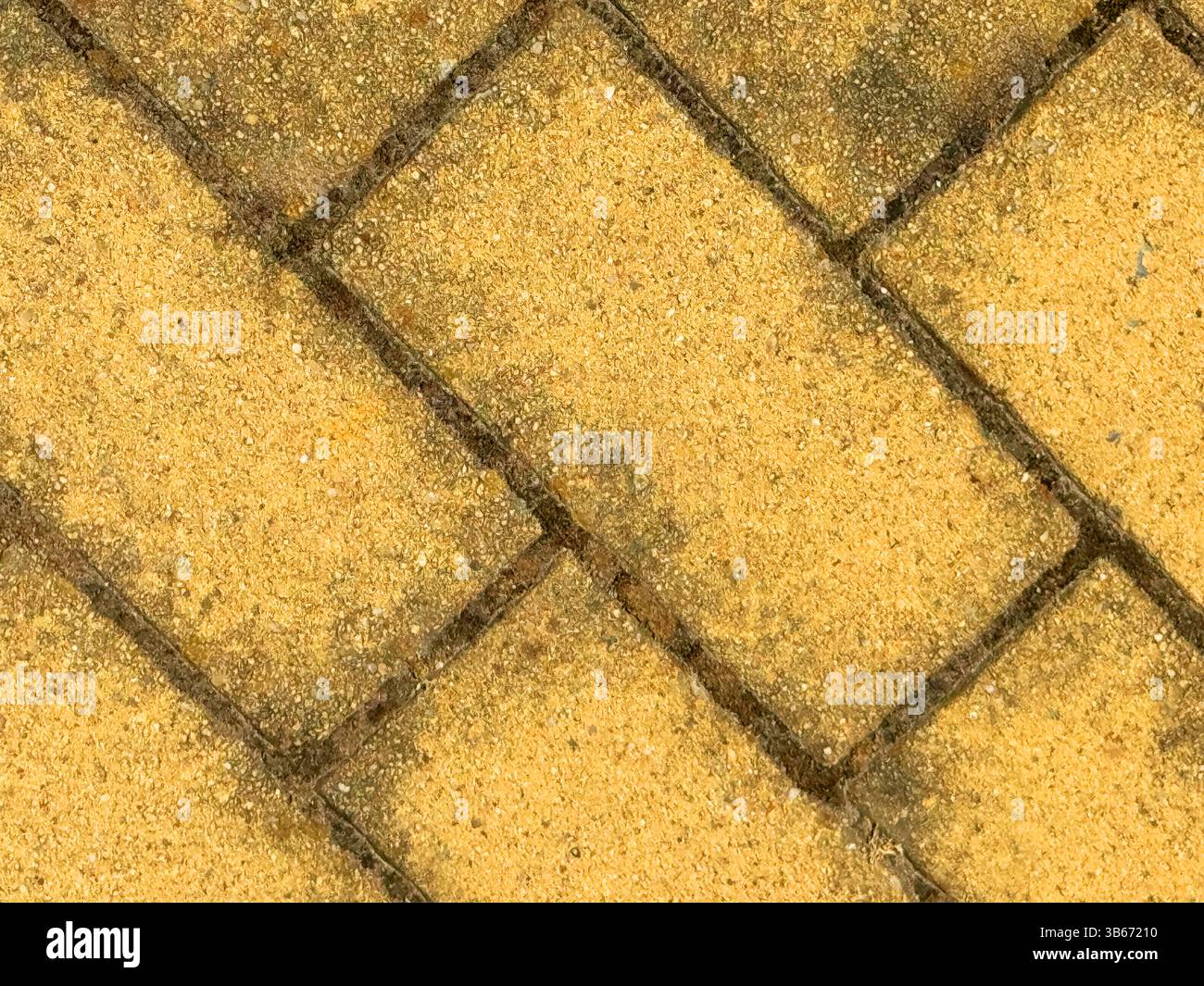 Textured Yellow Paving Stones in Diamond Pattern. Golden yellow ...