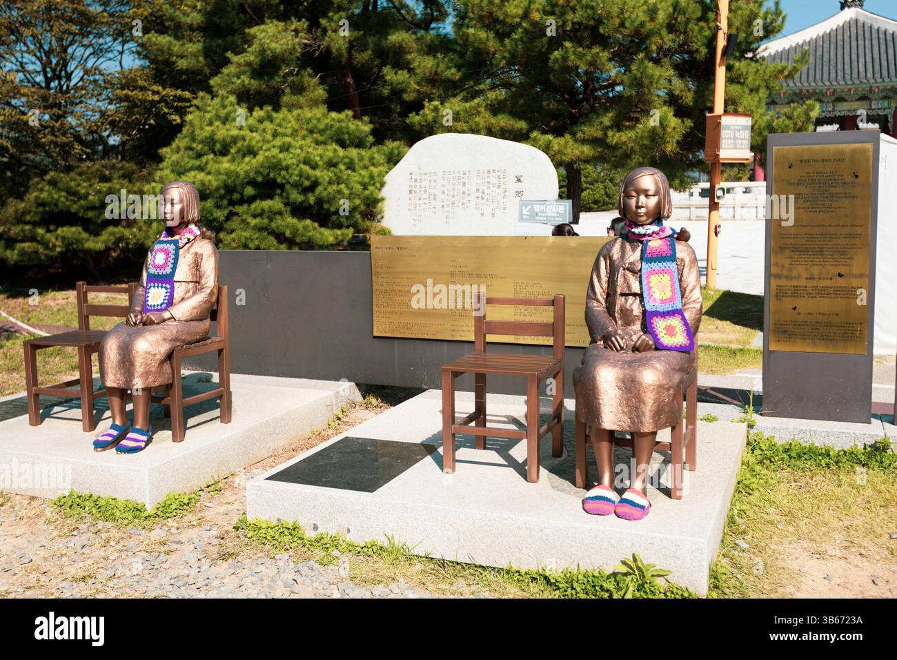 Bronze woman statues of peace at DMZ demilitarized zone in South Korea ...