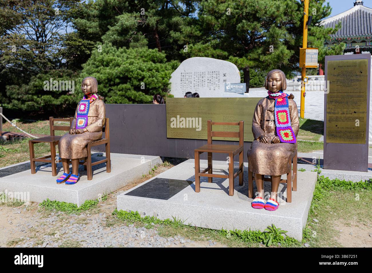 Bronze woman statues of peace at DMZ demilitarized zone in South Korea ...