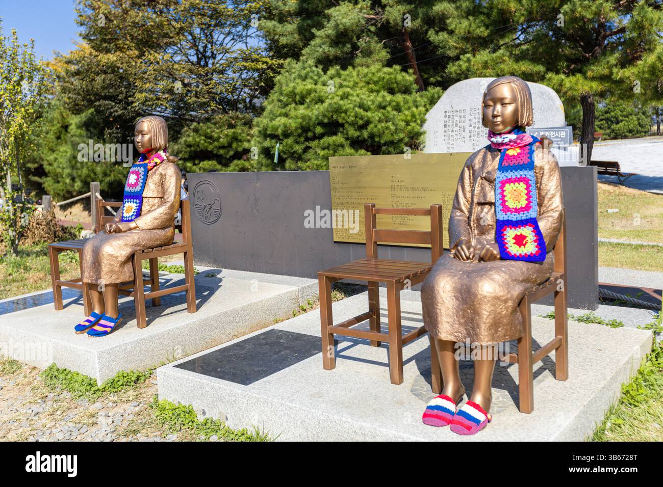 Bronze woman statues of peace at DMZ demilitarized zone in South Korea ...