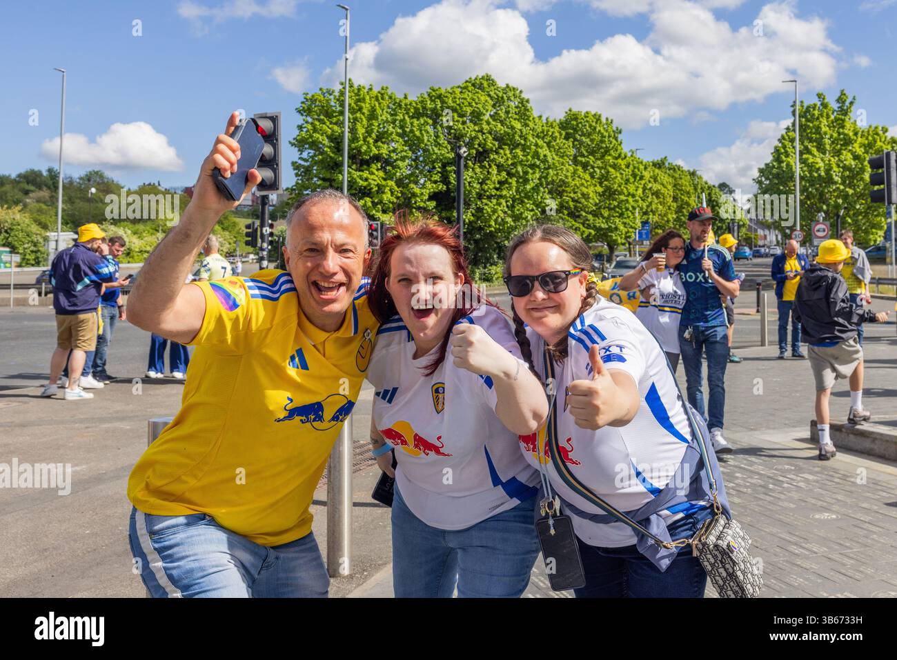 Leeds, UK. 03 MAY, 2025. People pose for a picture as Leeds United fans ...