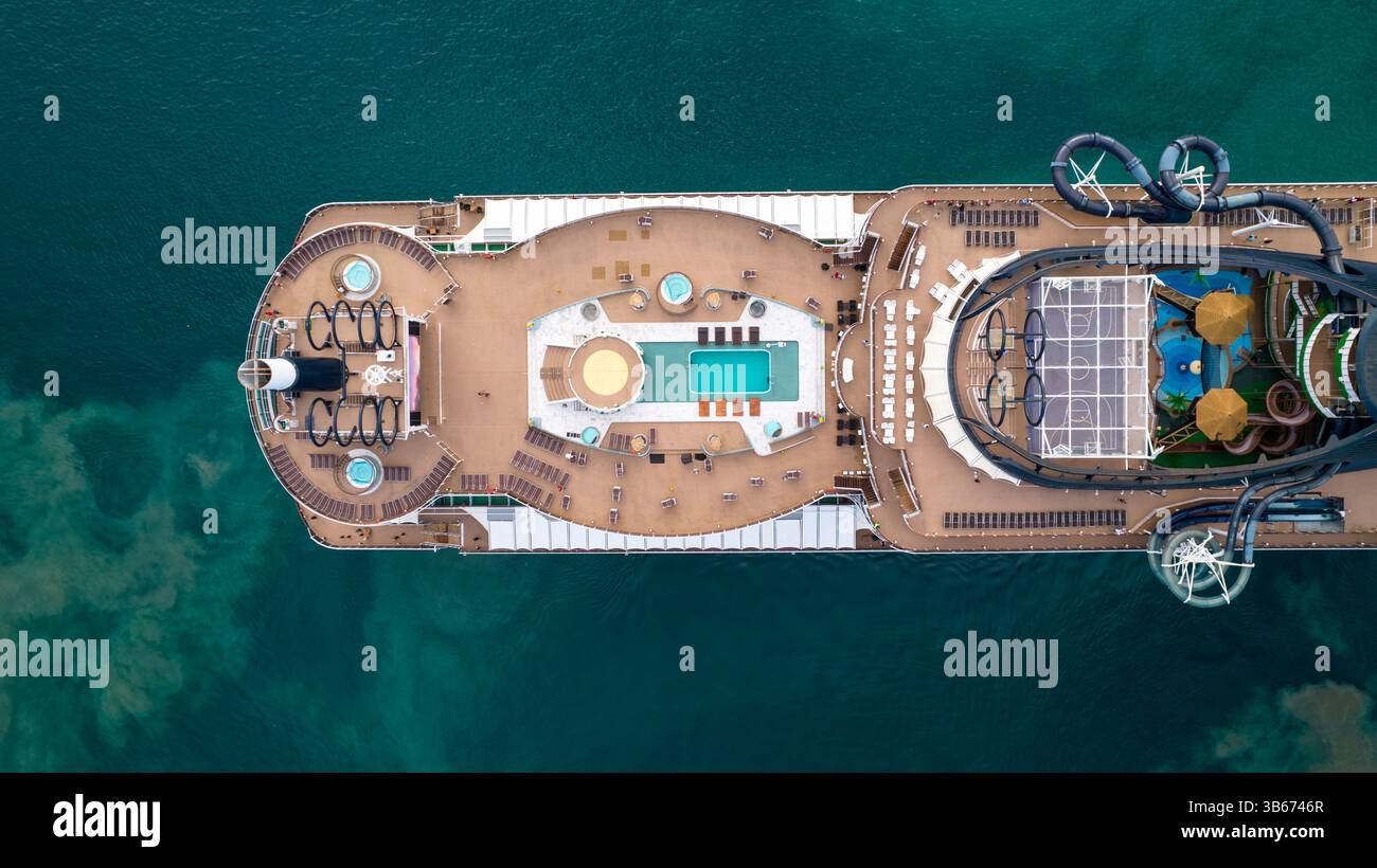 Aerial view top down of stern upper deck of luxurious cruise ship with ...