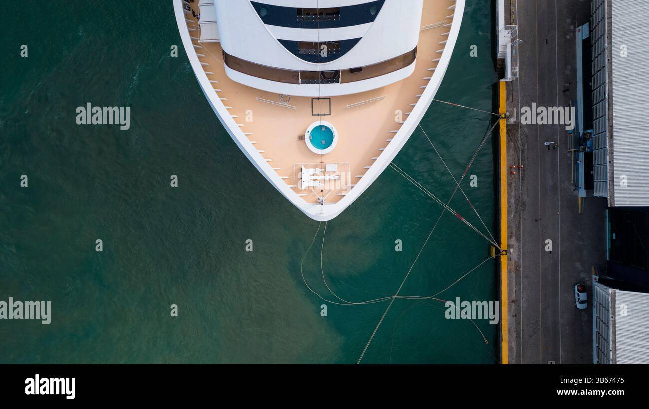 Tip of vessel with small round pool, Bow of huge ship moored in port by ...