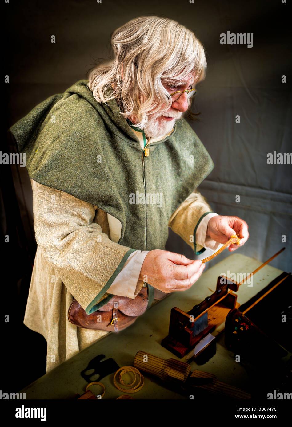 Portrait of a male medieval bow and arrow maker at a medieval event in ...