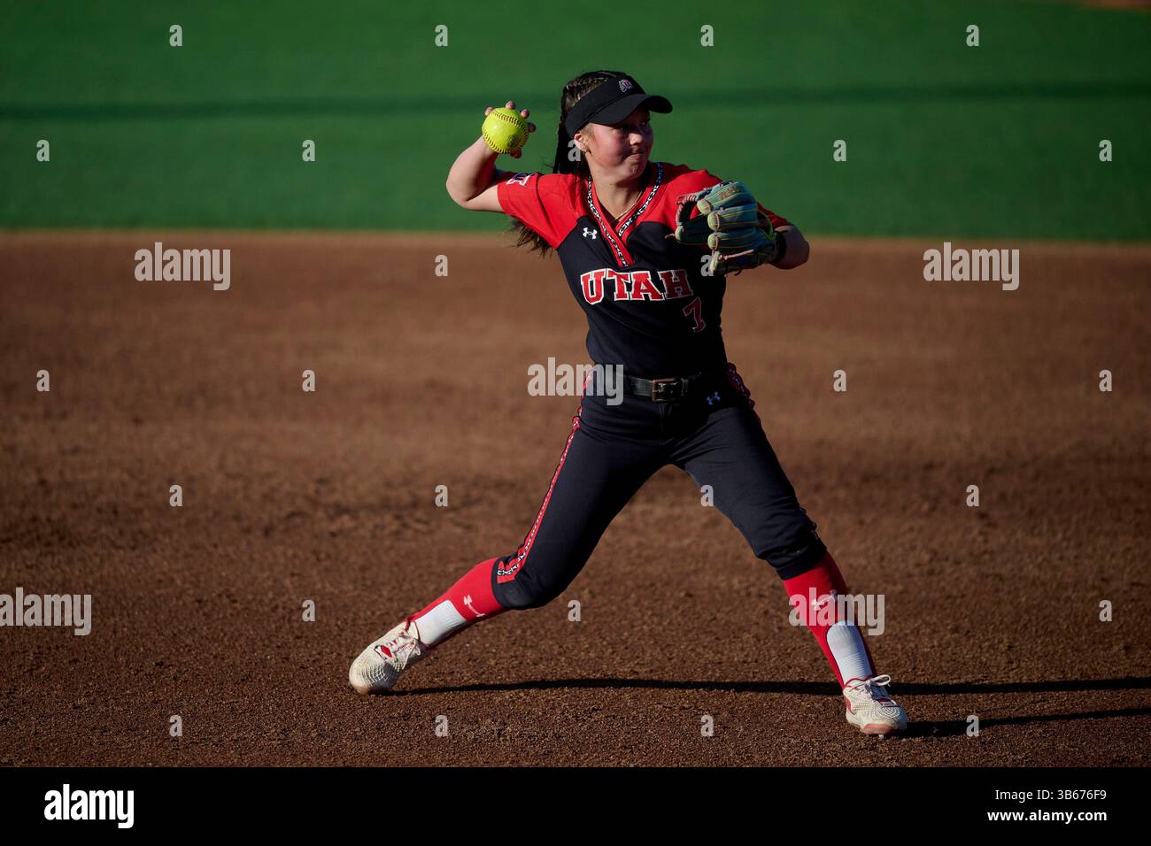 Utah Utes third baseman Sianni Sakai (7) throws to first base during an ...