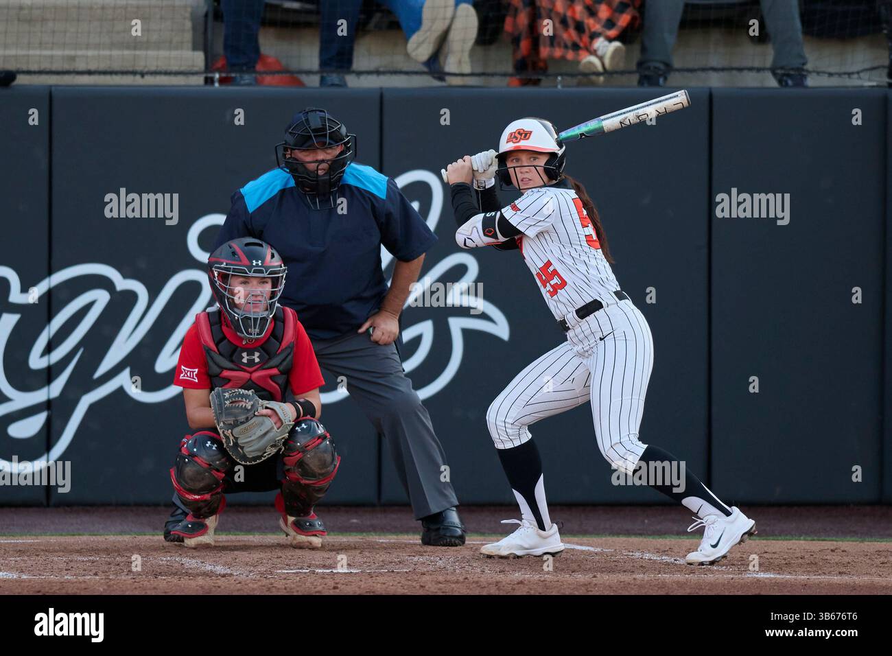 Oklahoma State Cowgirls Megan Bloodworth (55) bats during an NCAA ...