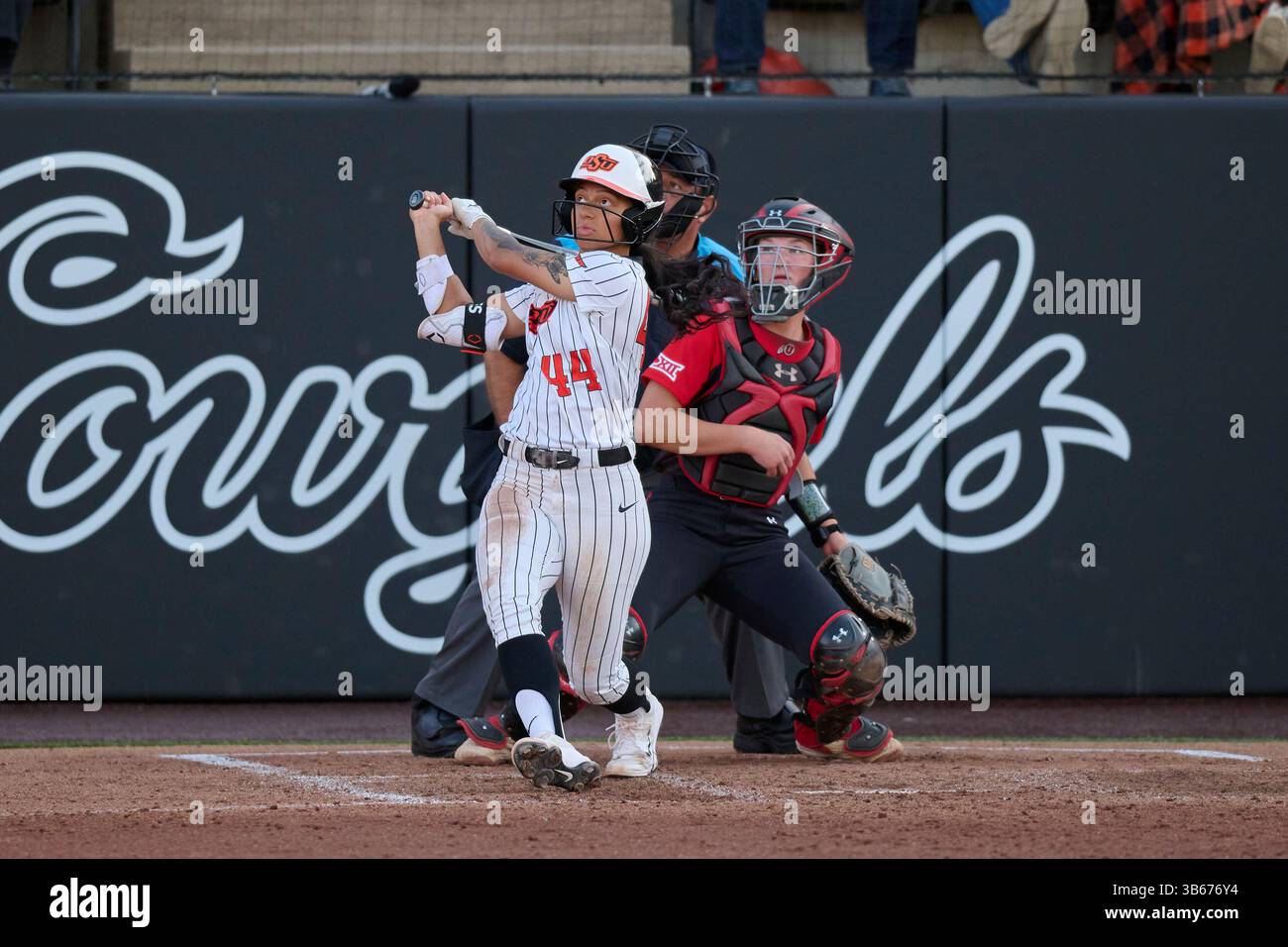 Oklahoma State Cowgirls Tallen Edwards (44) bats during an NCAA ...
