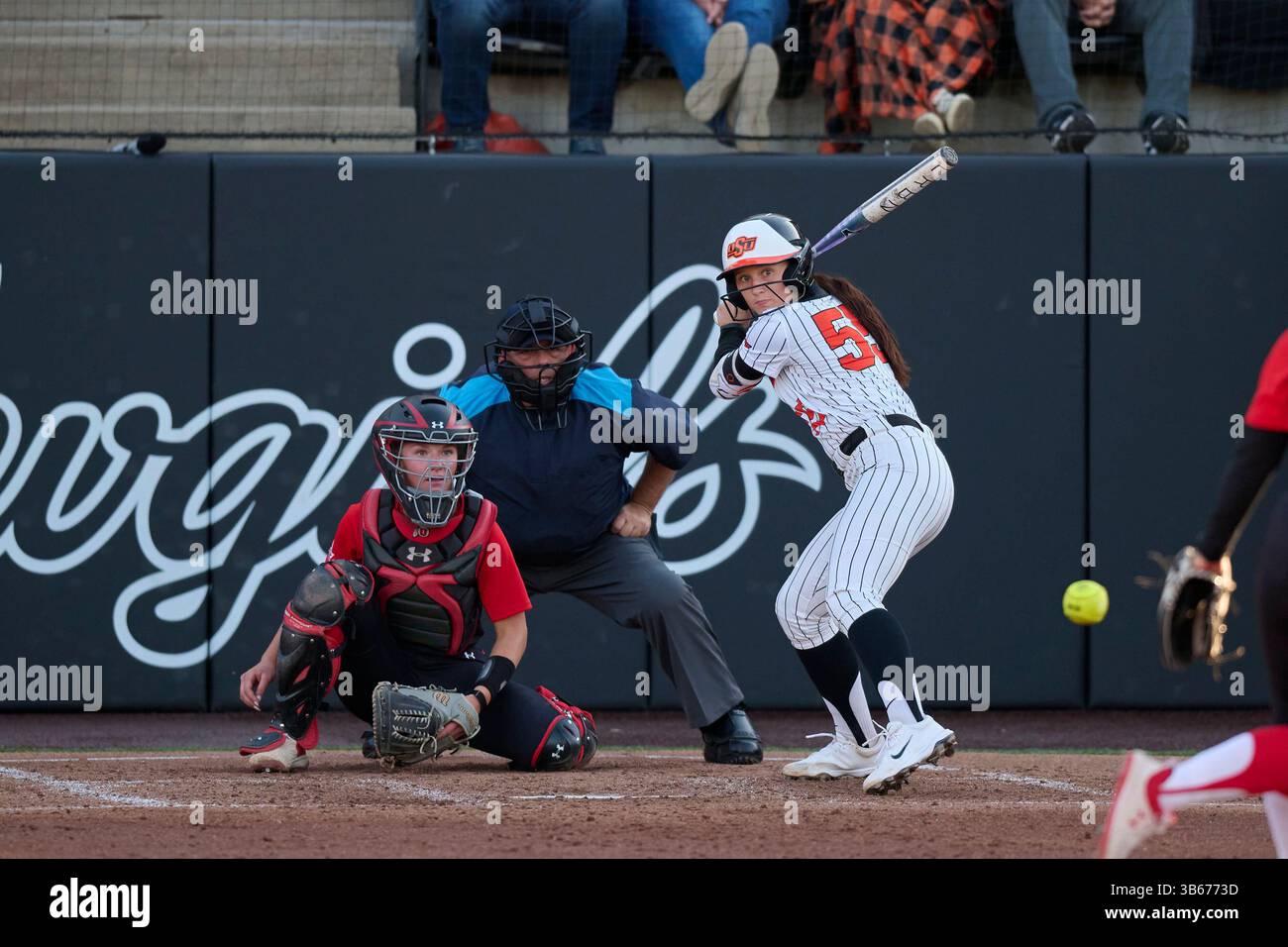 Oklahoma State Cowgirls Megan Bloodworth (55) bats during an NCAA ...