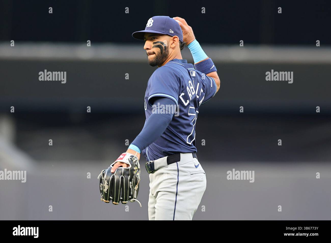 BRONX, NY - MAY 02: José Caballero #77 of the Tampa Bay Rays warms up ...