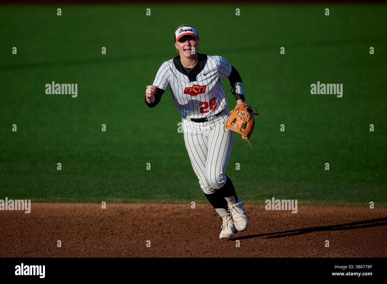 Oklahoma State Cowgirls second baseman Rosie Davis (26) celebrates an ...