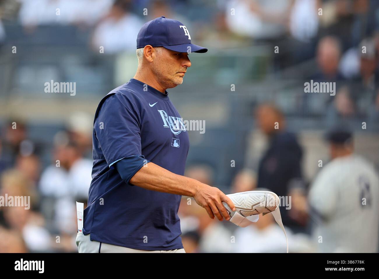 BRONX, NY - MAY 02: Kevin Cash #16 of the Tampa Bay Rays walks back to ...
