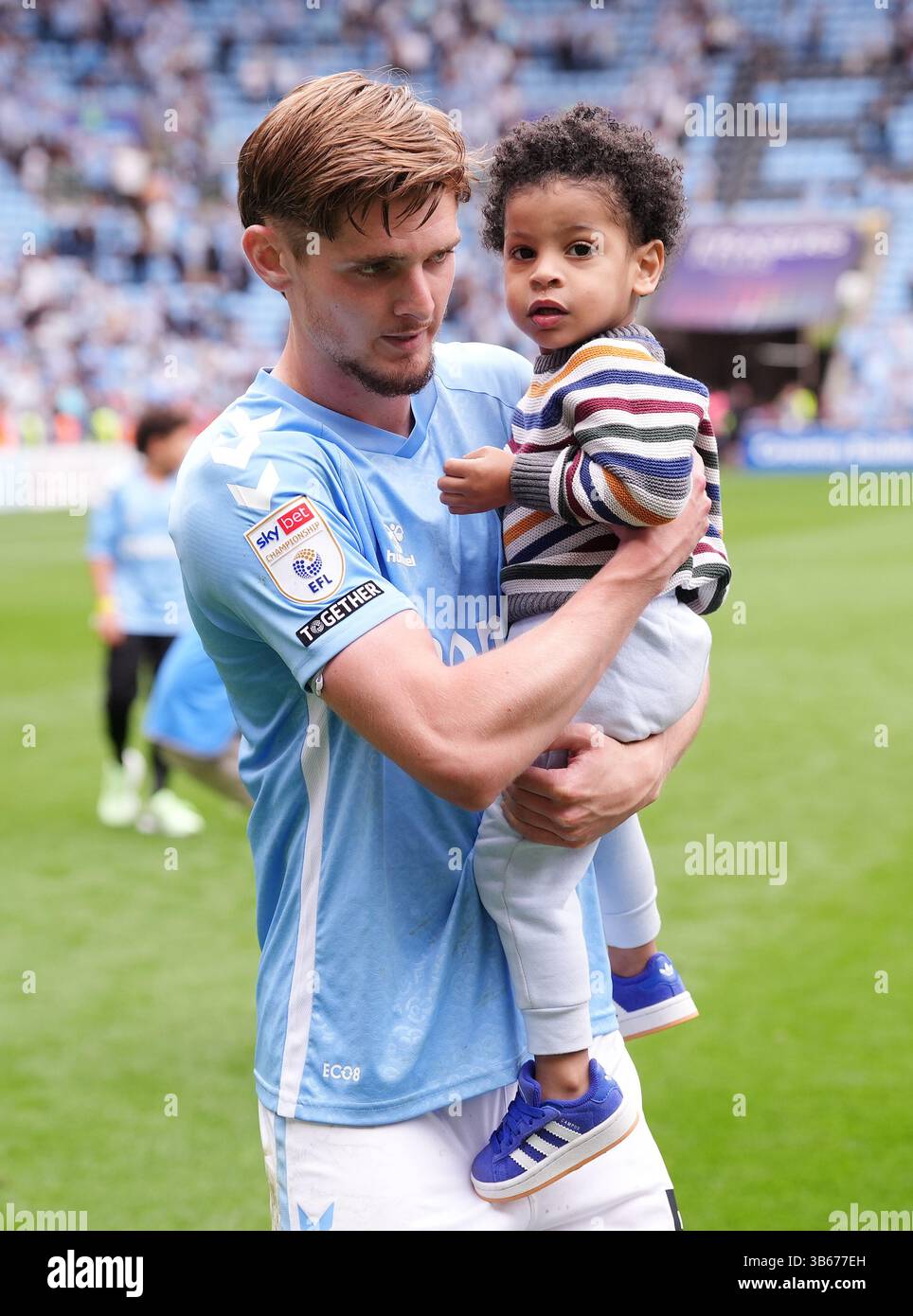 Coventry City's Jack Rudoni (left) and family after the Sky Bet ...
