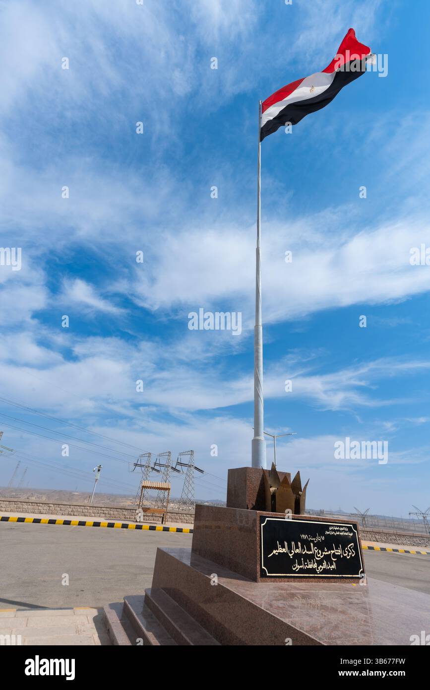 Aswan High Dam, Egypt - January 15, 2025: Egyptian flag flies by a ...