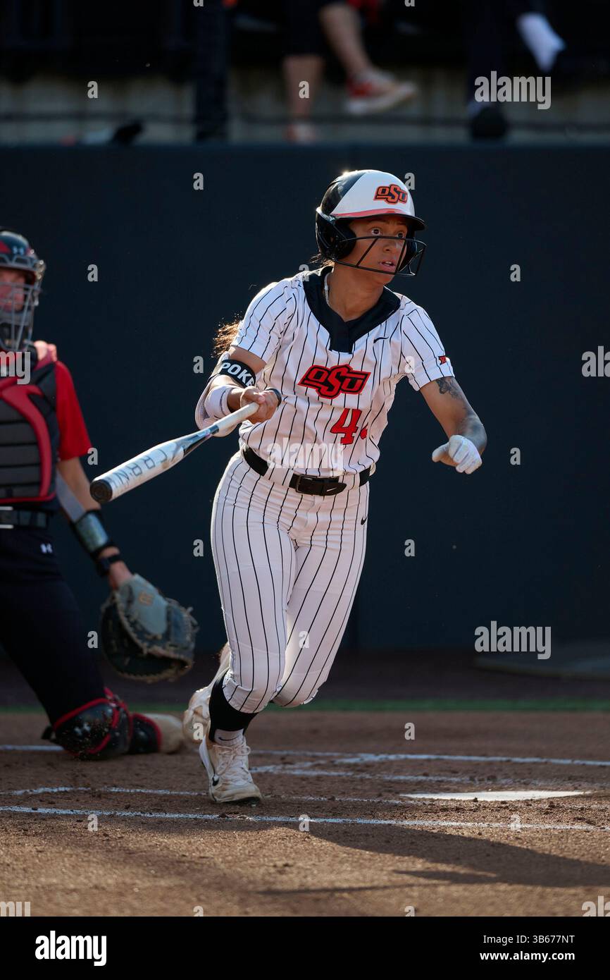 Oklahoma State Cowgirls Tallen Edwards (44) bats during an NCAA ...