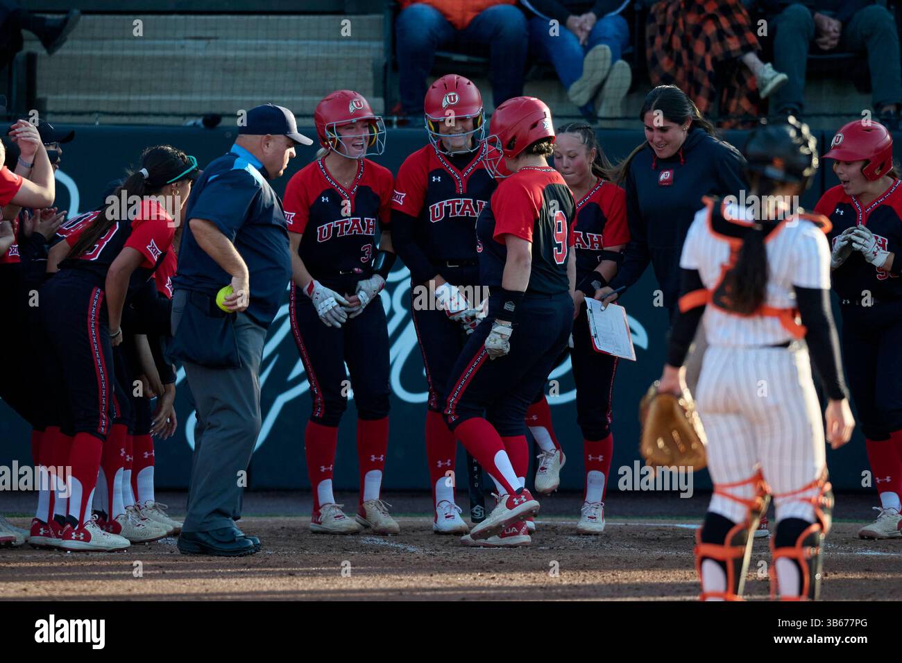 Utah Utes Emily Capobianco (9) celebrates with teammates after hitting ...