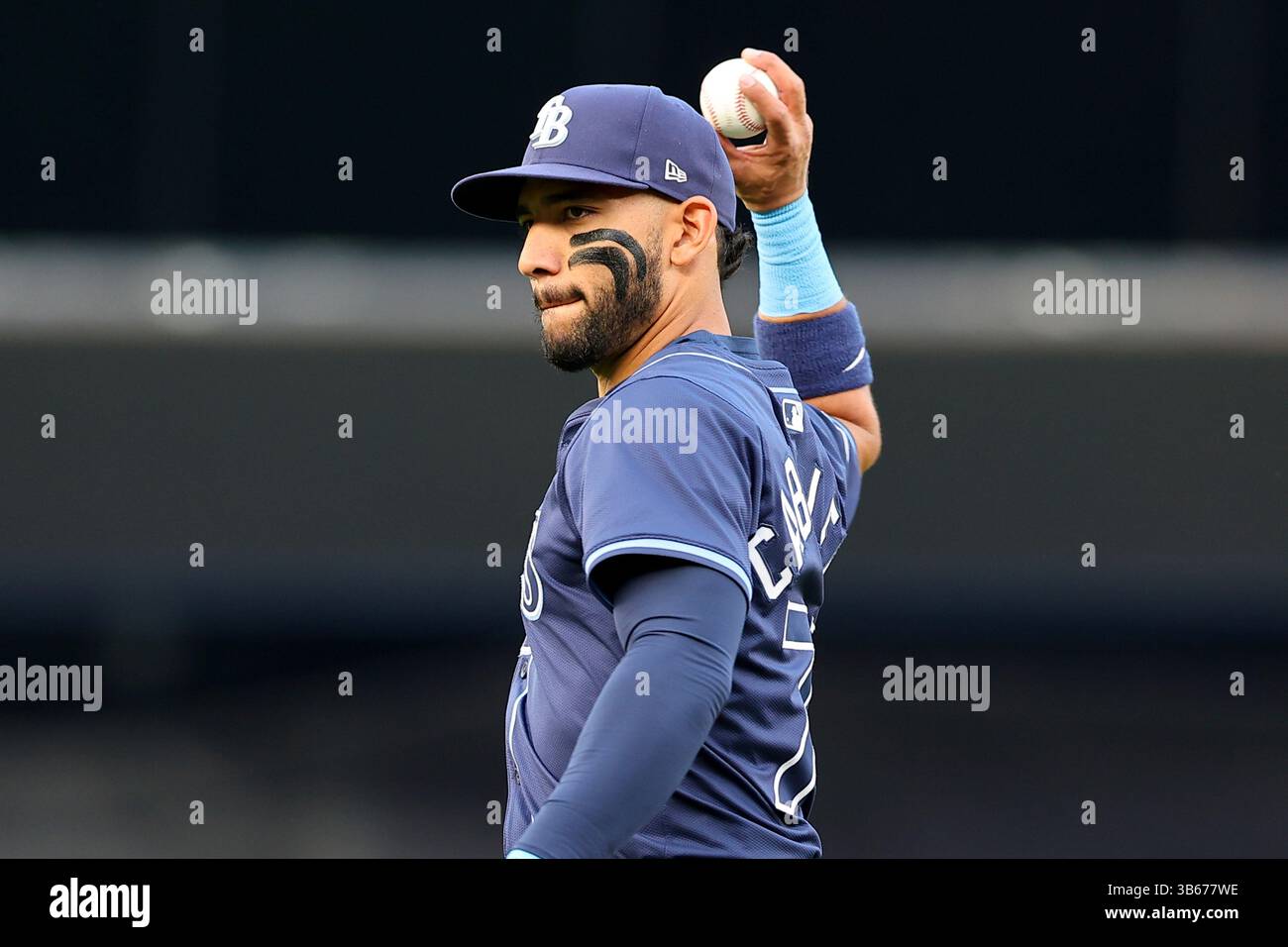 BRONX, NY - MAY 02: José Caballero #77 of the Tampa Bay Rays warms up ...