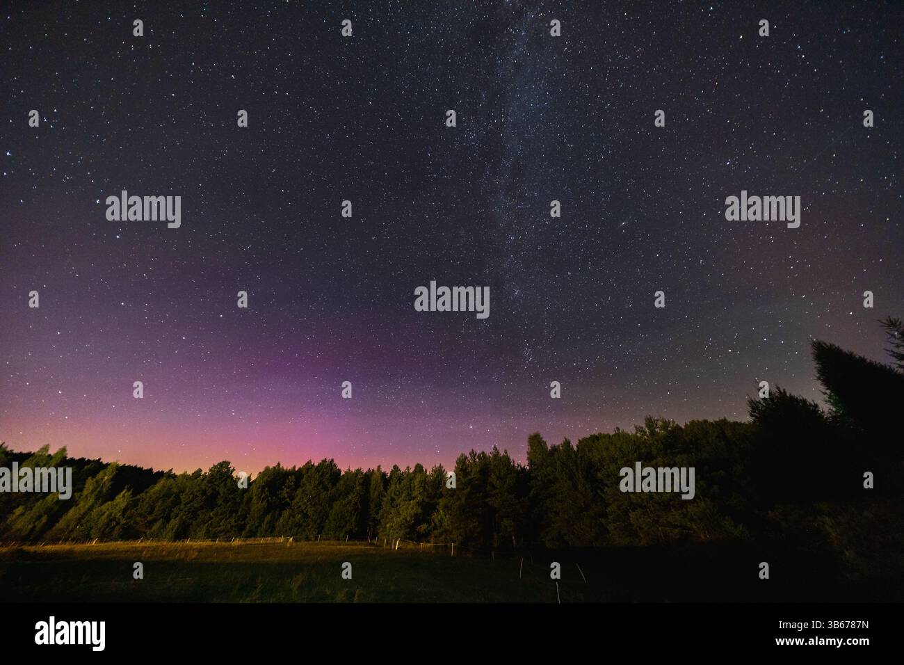 Beautiful dark night sky full of stars and flying Perseids in front of ...