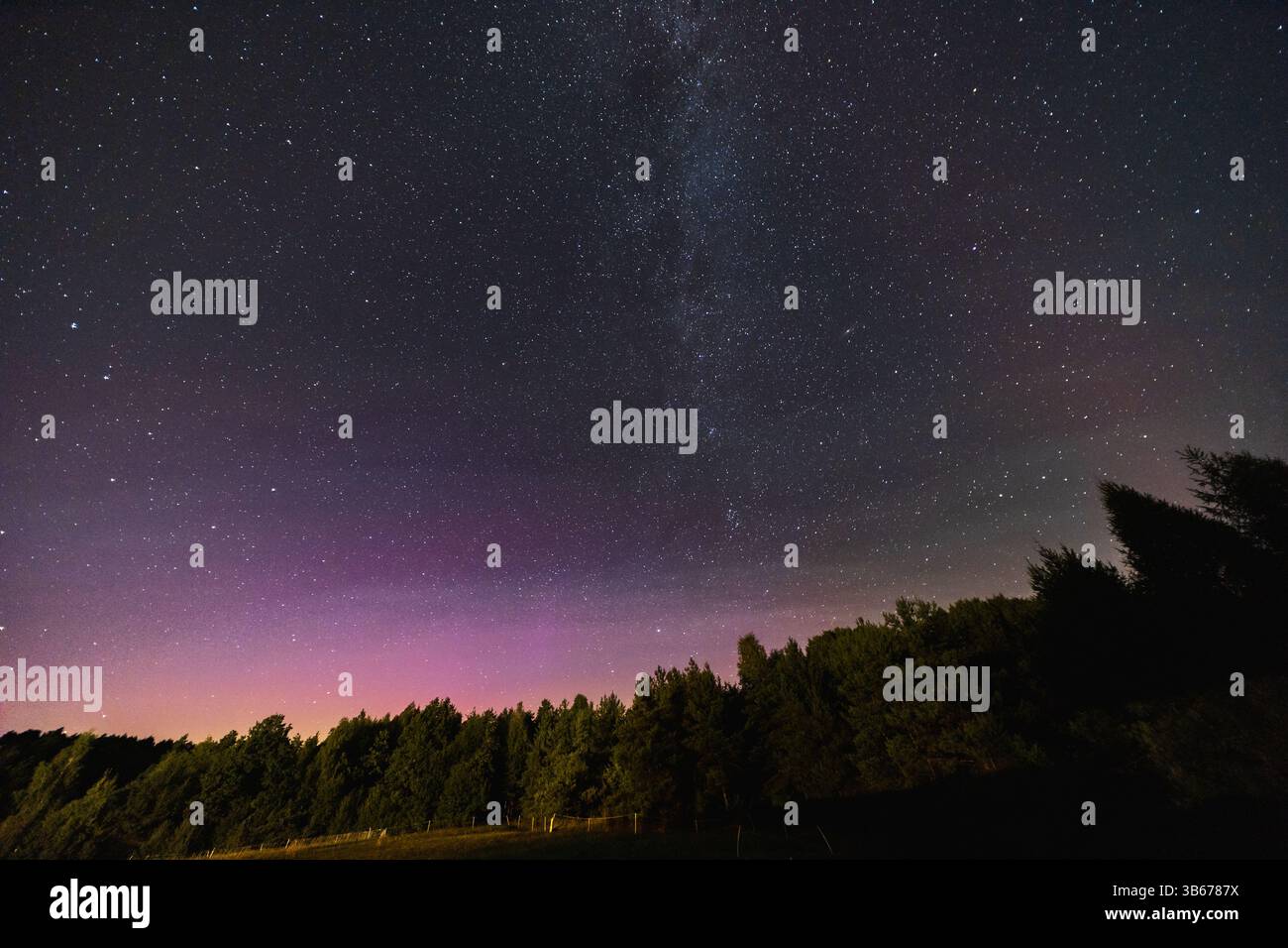 Beautiful dark night sky full of stars and flying Perseids in front of ...