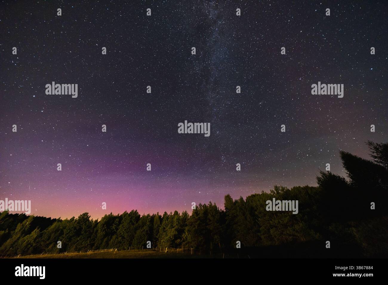 Beautiful dark night sky full of stars and flying Perseids in front of ...