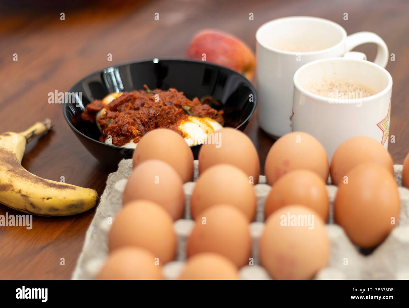 Closeup Image Of Egg Roast with Milky Tea And Fruits. Egg Tray on ...