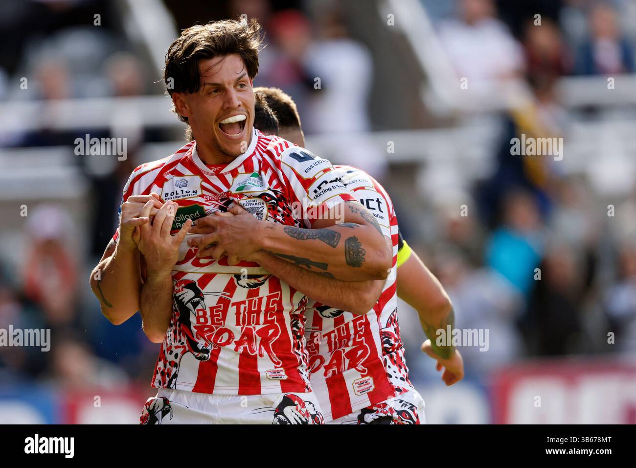 Leigh Leopards' Owen Trout celebrates his try during the Betfred Super ...